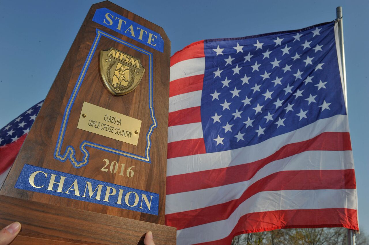 Trophy and American Flag – AHSAA NOW